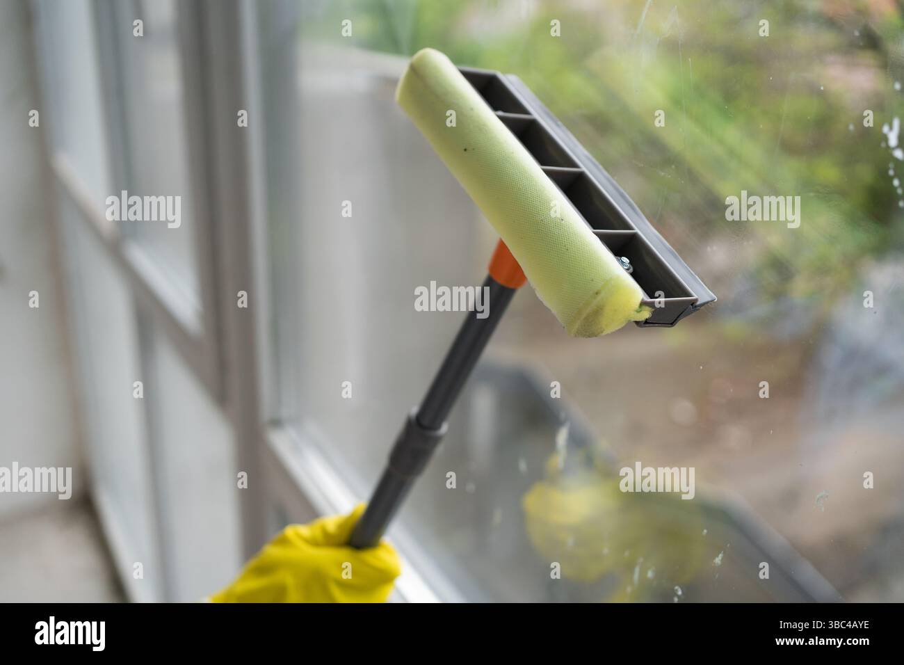 Cleaning window using special hi-res stock photography and images - Alamy