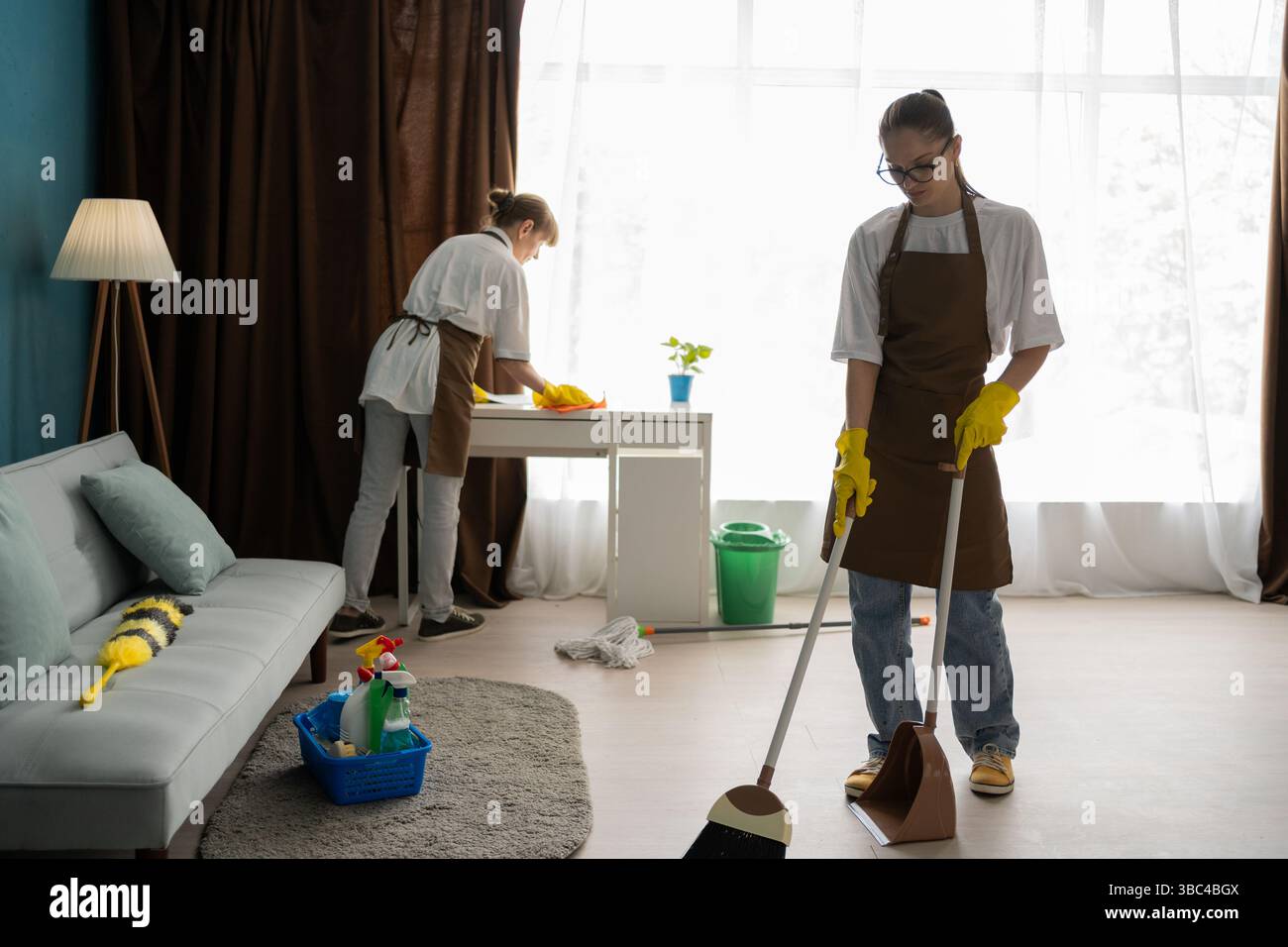 cleaning service, team clean at home in the living room, professional ...