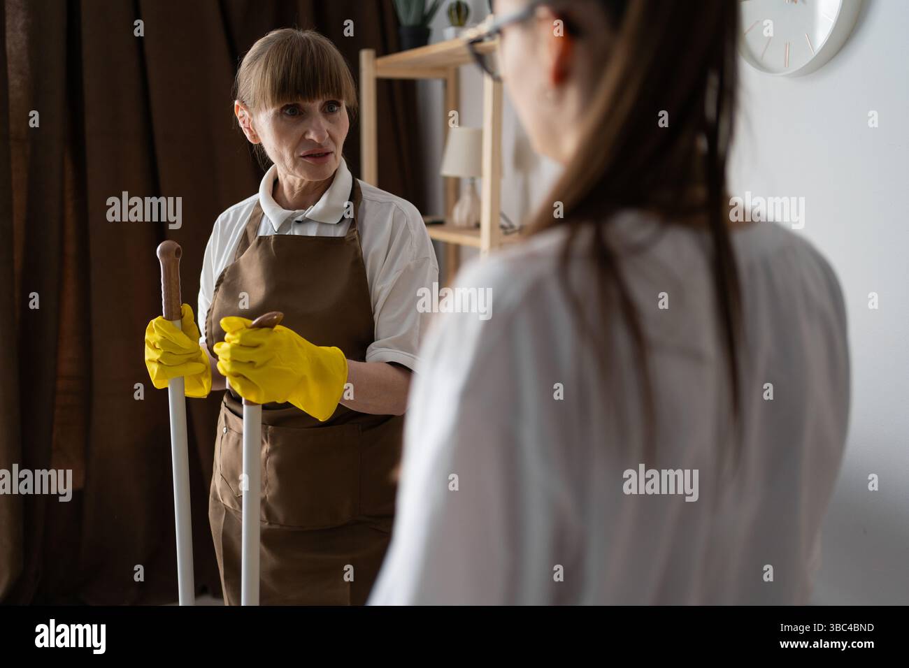 Housework and cleaning concept. Female team of janitors from professional cleaning service ...