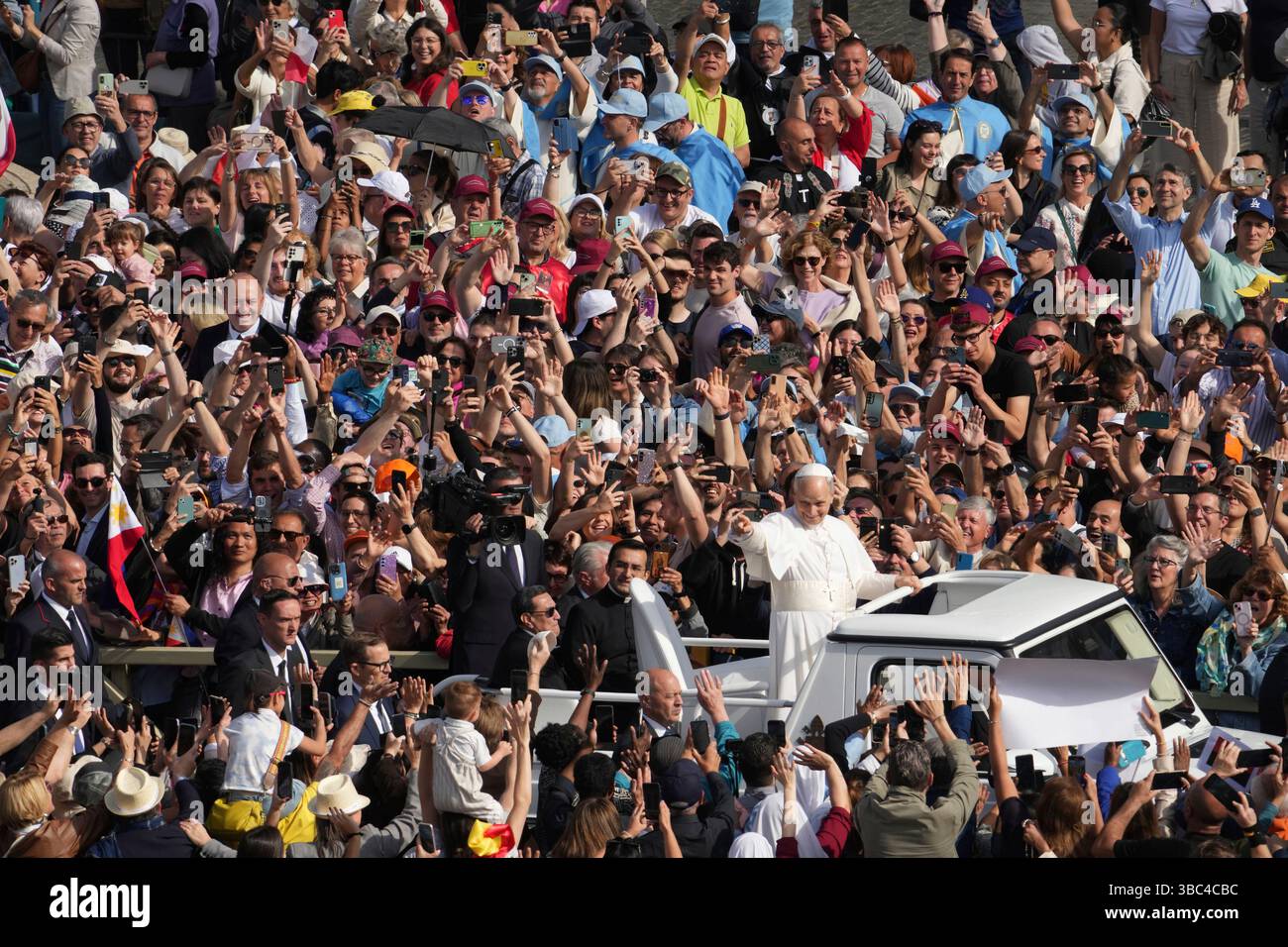 Pope Leo XIV on his popemobile tours St. Peter's Square at the Vatican ...