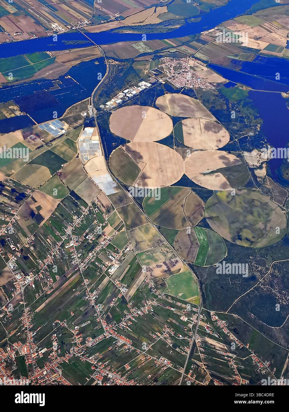 Unique aerial perspective showing circular farmlands near rivers and ...