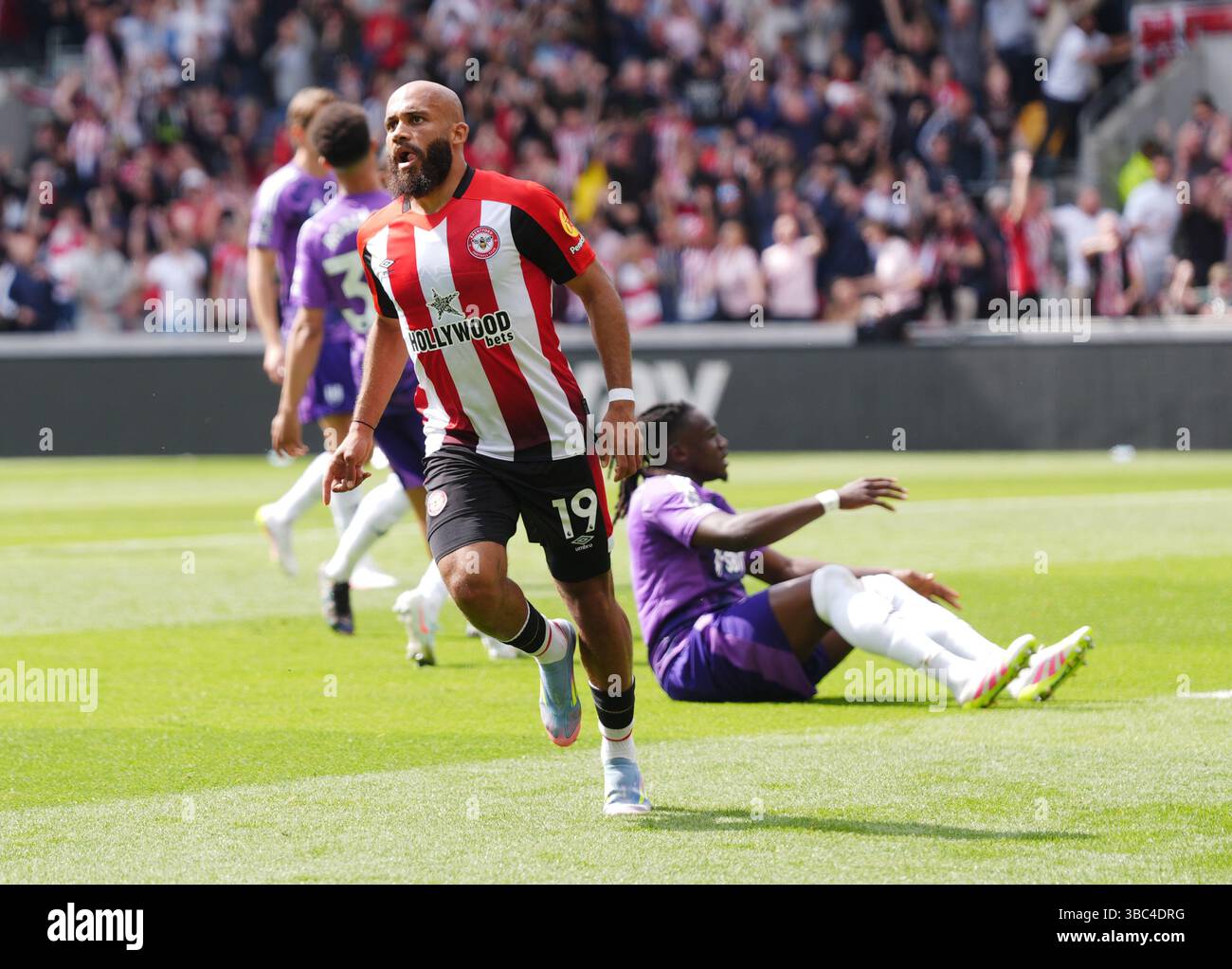 Brentford's Bryan Mbeumo celebrates scoring their side's first goal of ...