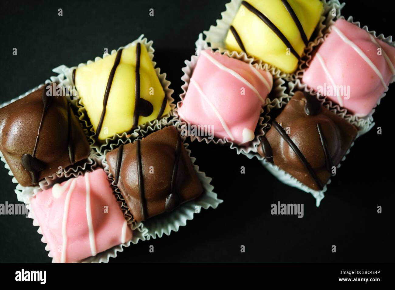 London UK, May 18 2025, A Selection of Iced Individual Iced Sponge ...