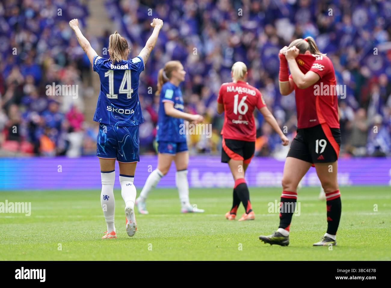 Chelsea's Nathalie Bjorn (left) celebrates winning the Adobe Women's FA ...