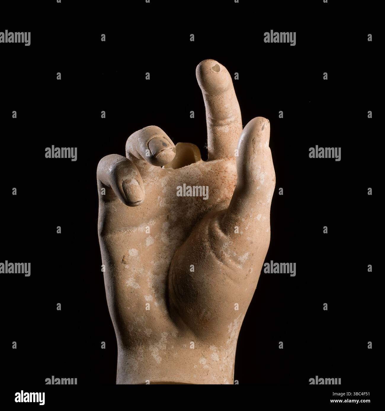 A sculpted hand gesture captures attention with its realistic depiction ...
