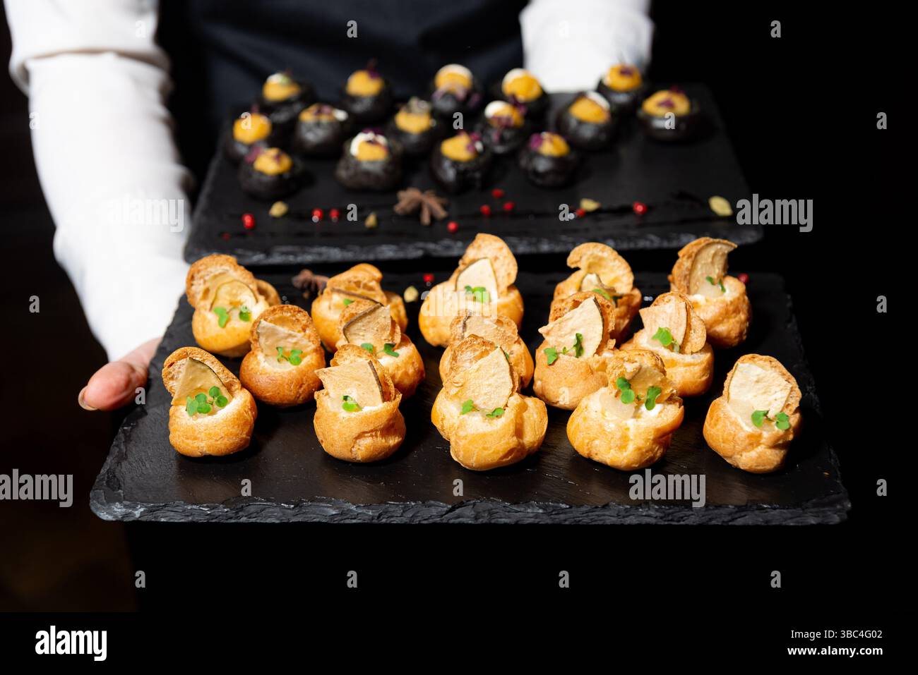 Waiter presenting assortment gourmet hi-res stock photography and ...