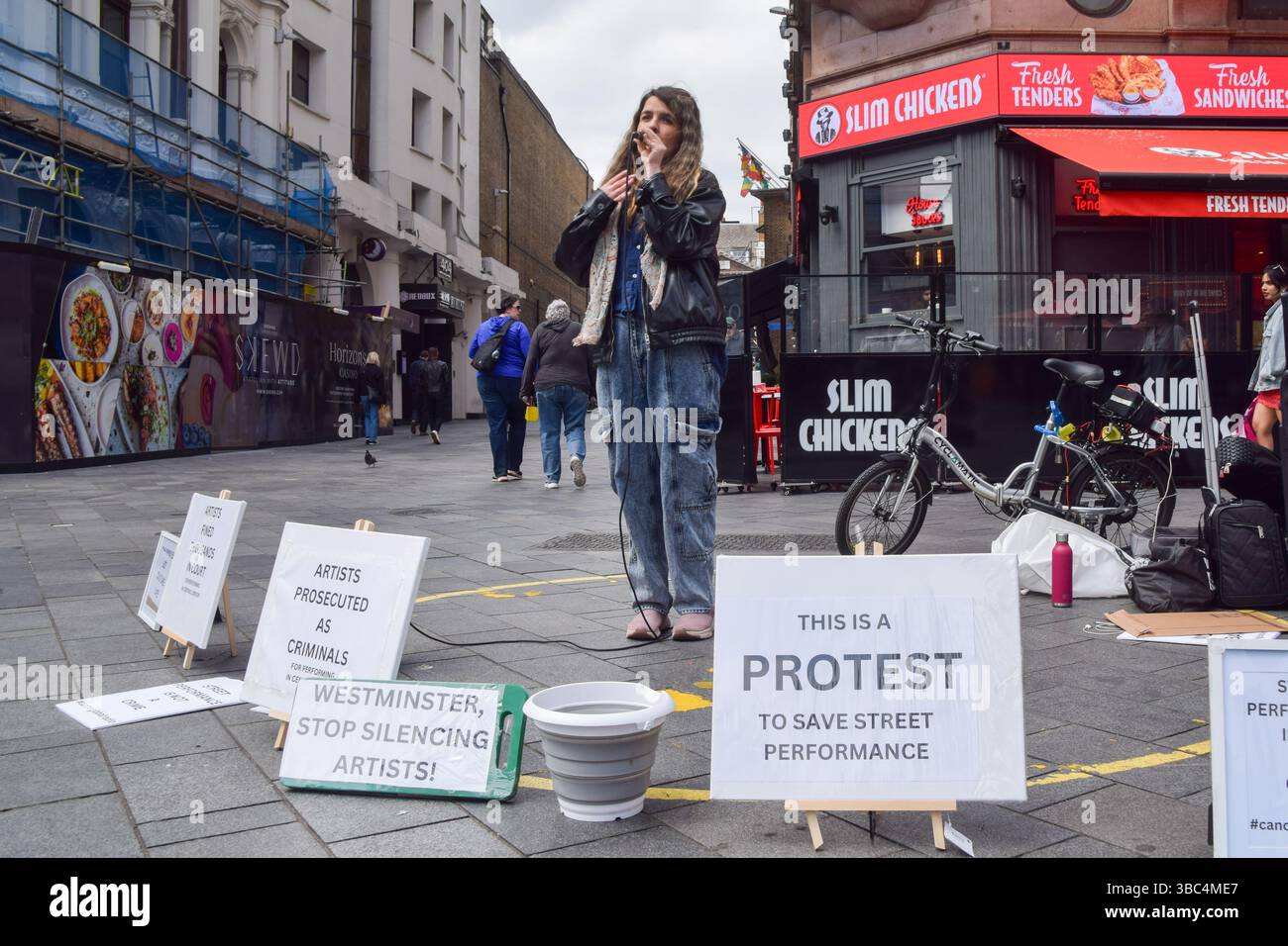 London, England, UK. 18th May, 2025. A busker performs in Leicester ...