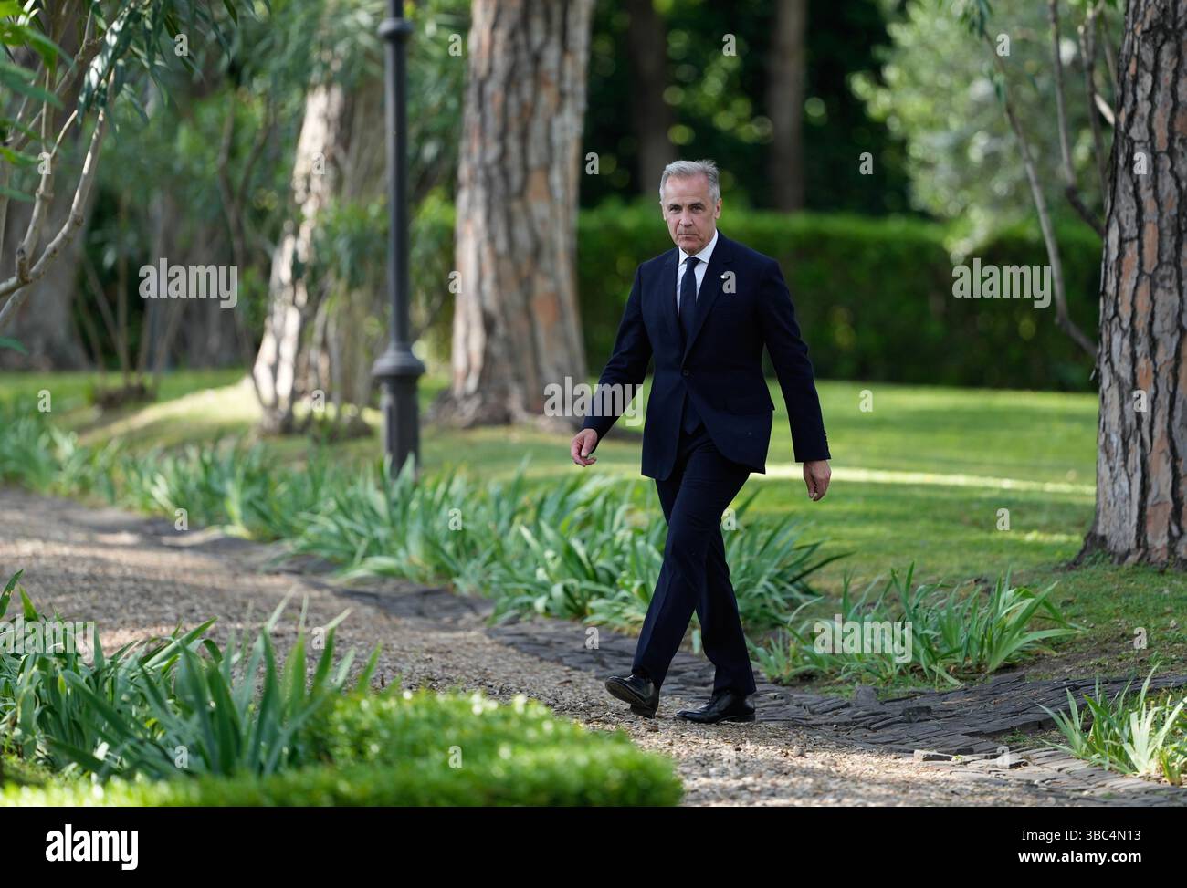 Prime Minister Mark Carney leaves a news conference in Rome at the ...