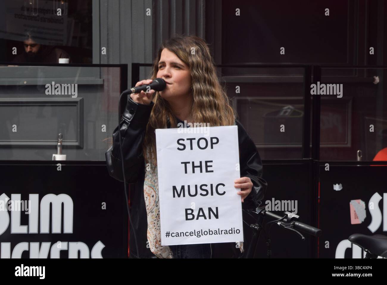 London, UK. 18th May 2025. A busker performs in Leicester Square in ...