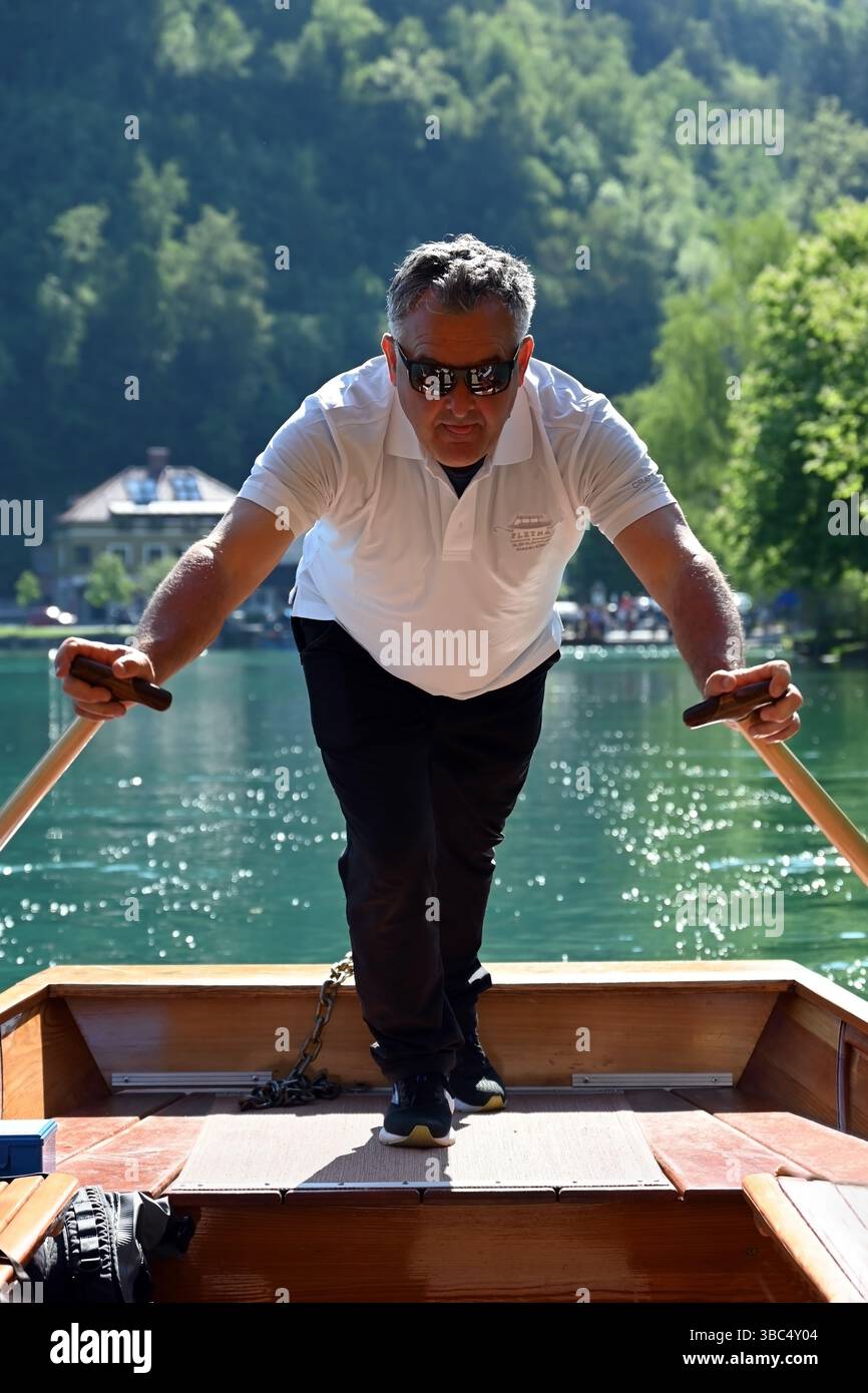 Lake Bled, Bled, Slovenia - May 1 2025: Pletnarstvo oarsman standing ...