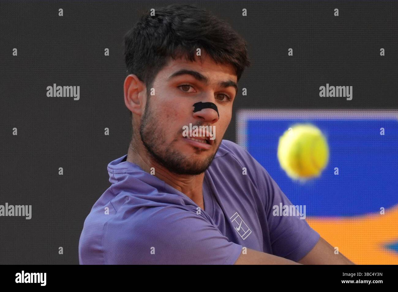 Carlos Alcaraz of Spain, eyes on the ball during a final tennis match ...