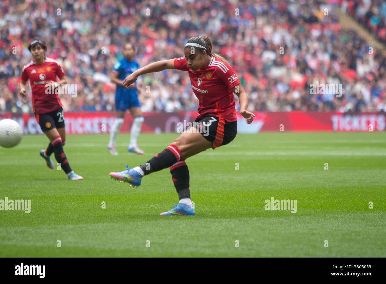 Wembley, UK. 18th May, 2025. Gabby George (3 Man Utd) in action ahead ...