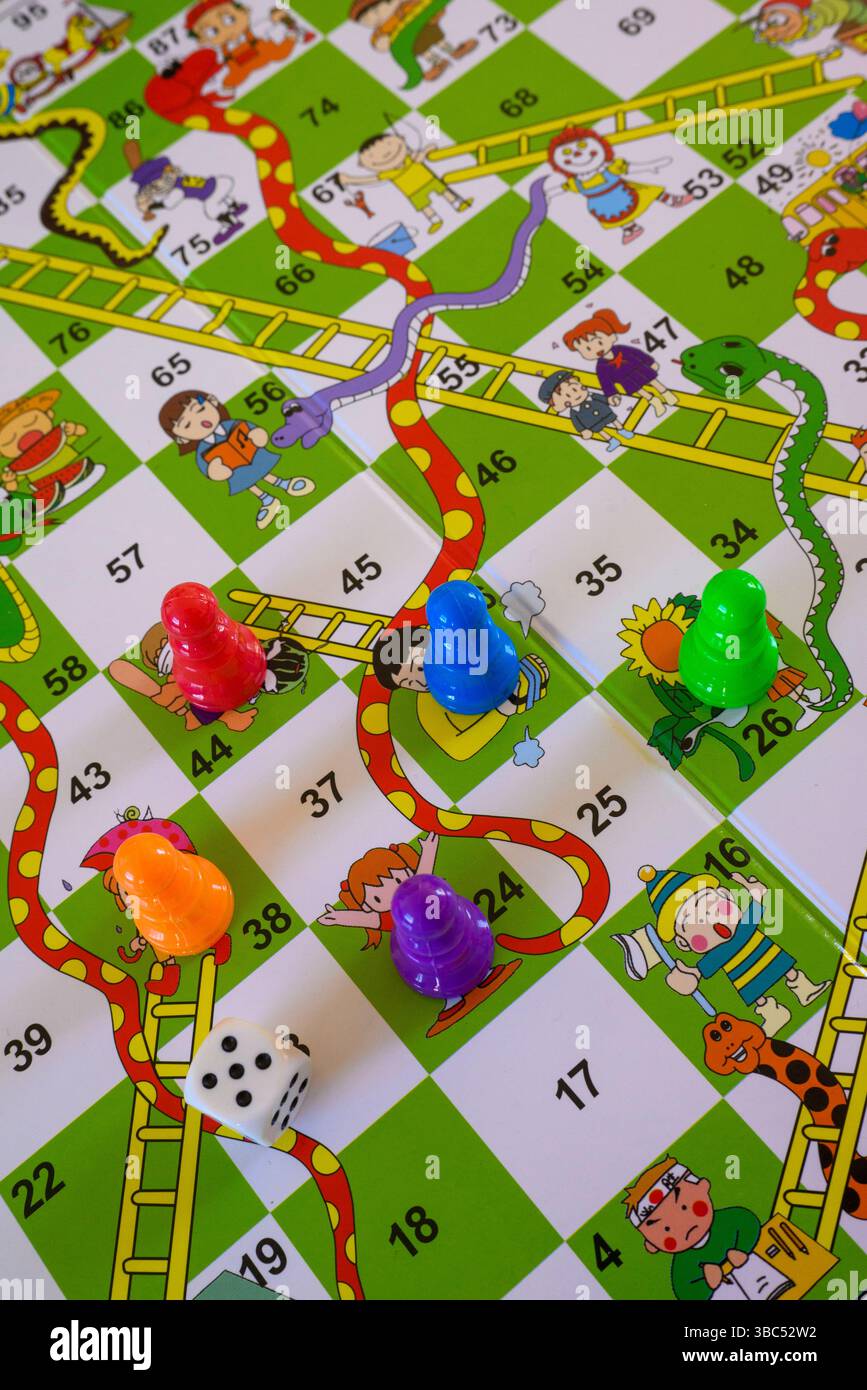 Snakes and Ladders board game Stock Photo - Alamy