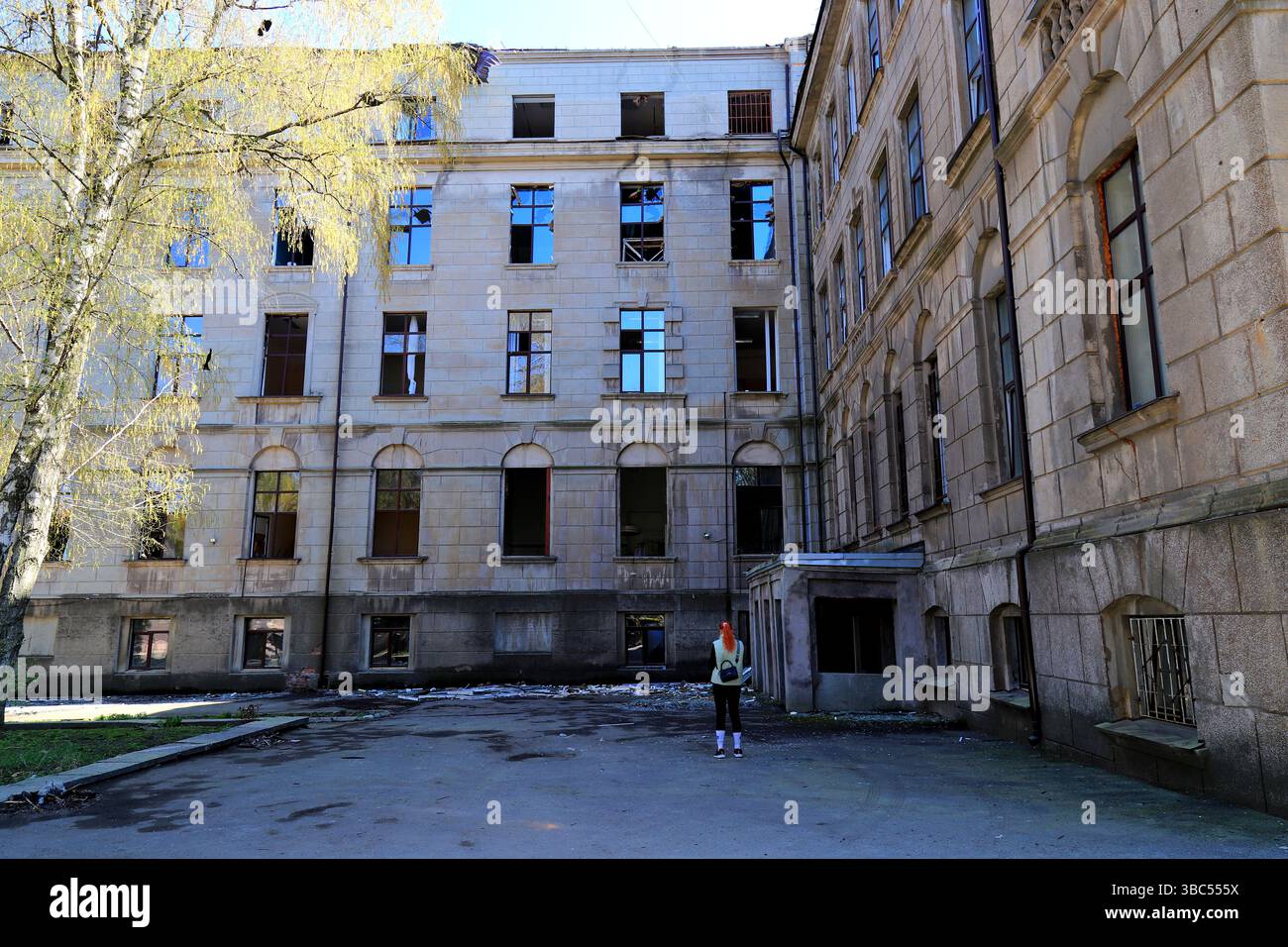 War in Ukraine. Broken windows in the destroyed building of the medical ...