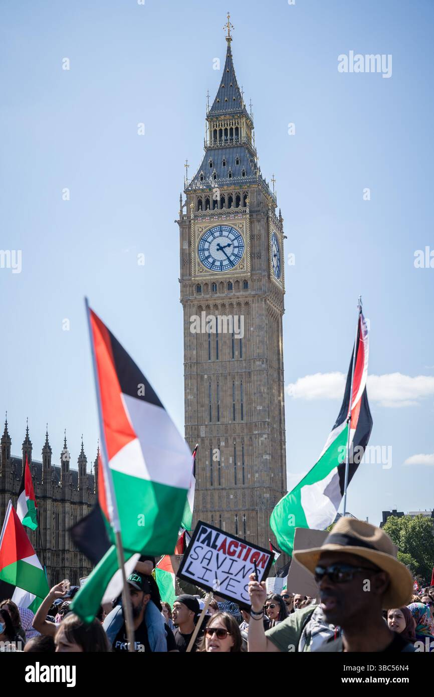 London, UK – May 17, 2025: Protesters wave Palestinian flags in front ...