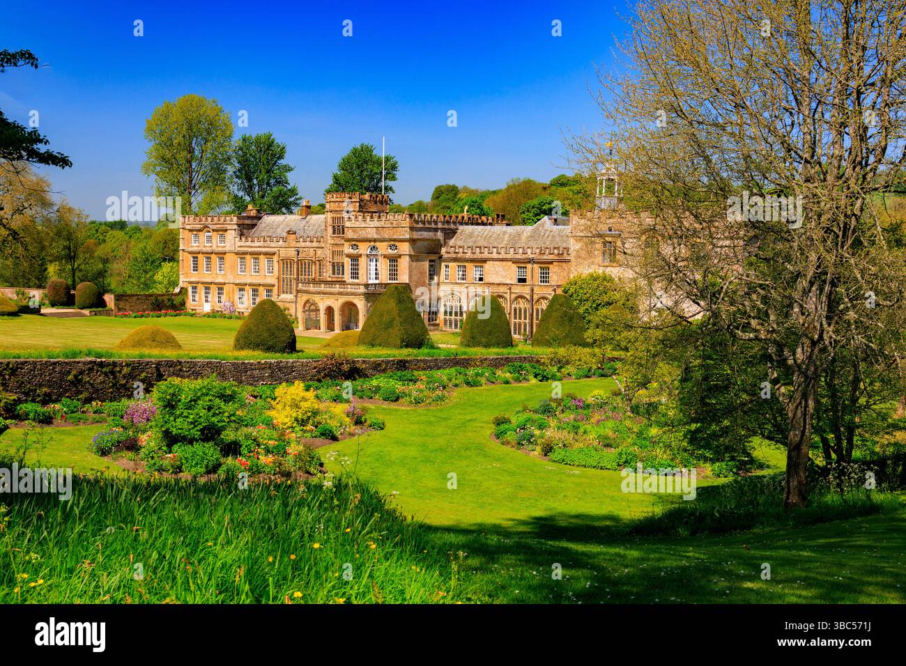 The impressive south front and colourful Park Garden at Forde Abbey ...