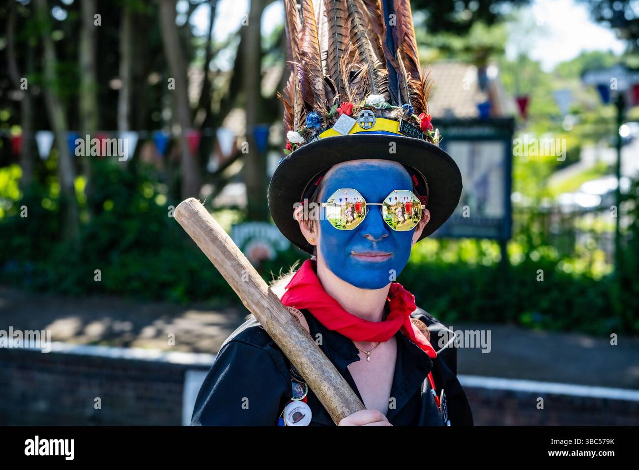 A lady Morris dancer with a blue face. Alresford Watercress Festival ...