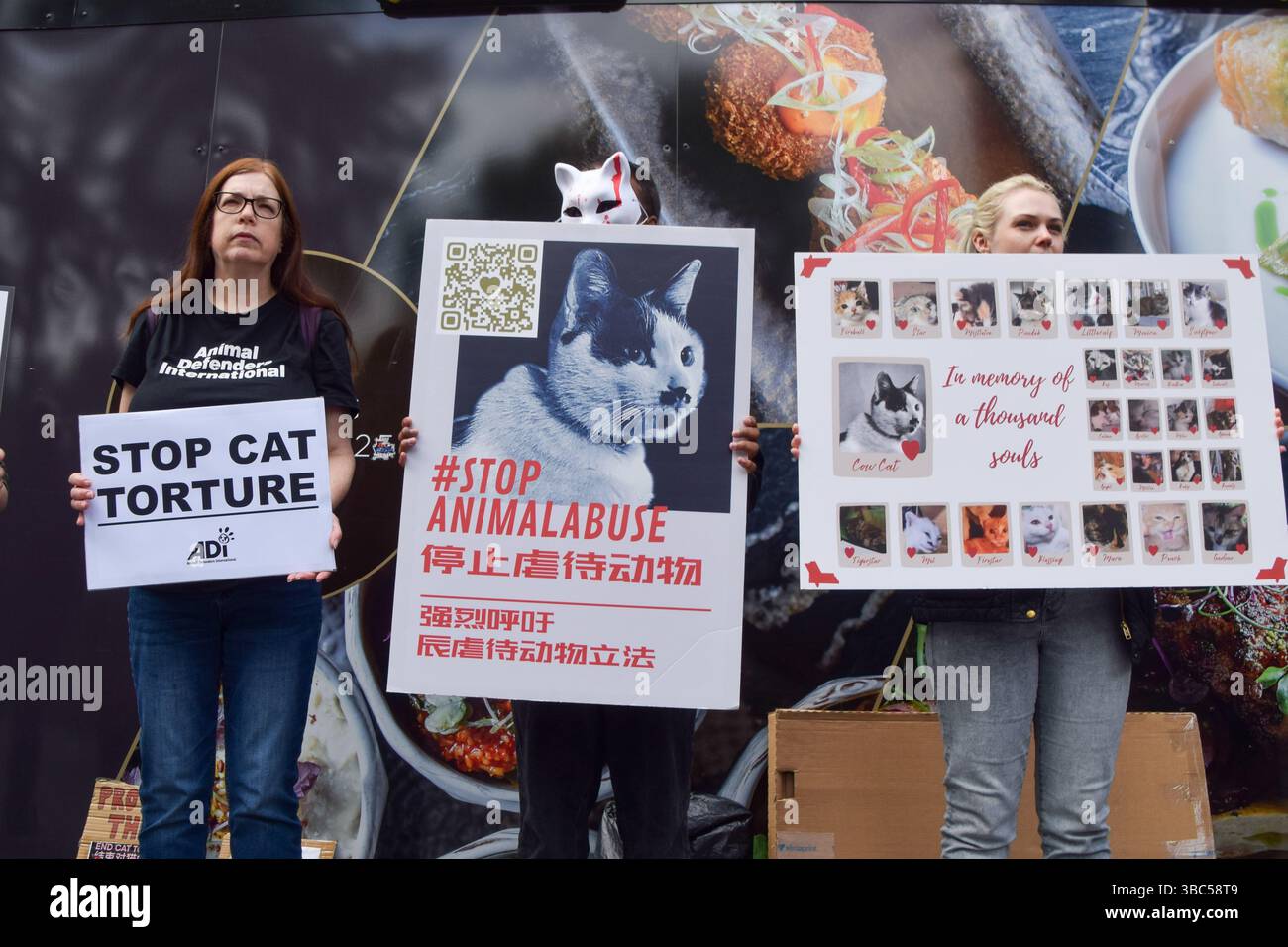 London, UK. 18th May, 2025. Activists hold placards during the protest ...