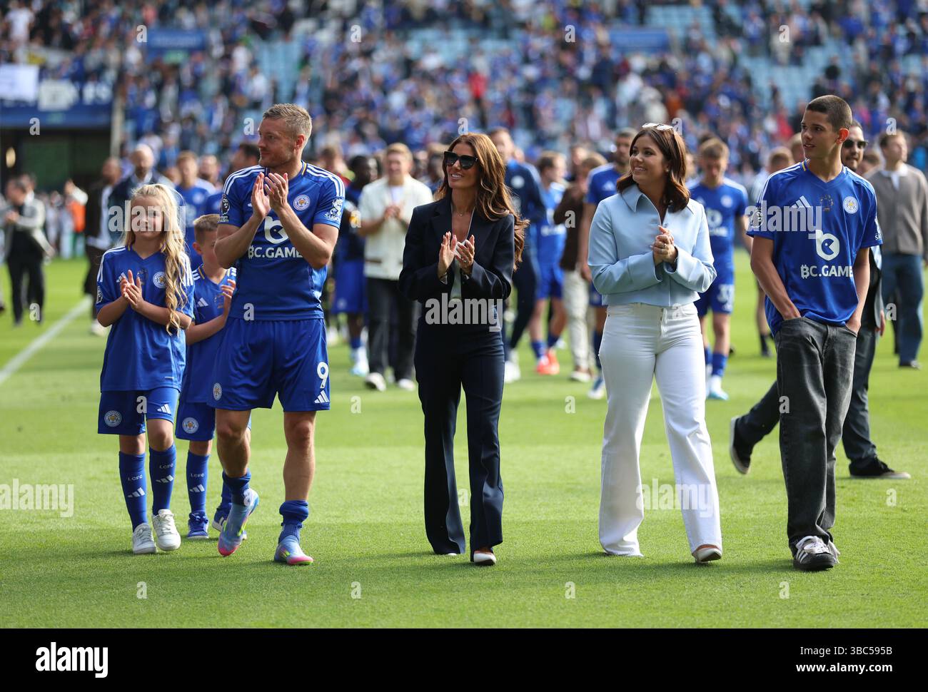 Leicester City's Jamie Vardy with his family on the pitch after the ...