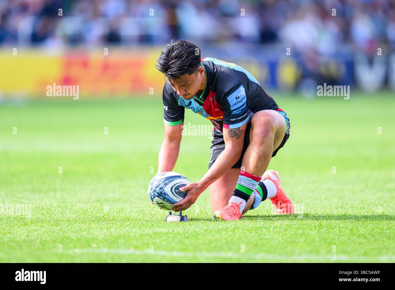 LONDON, UNITED KINGDOM - May 18: Marcus Smith of Harlequins takes a ...