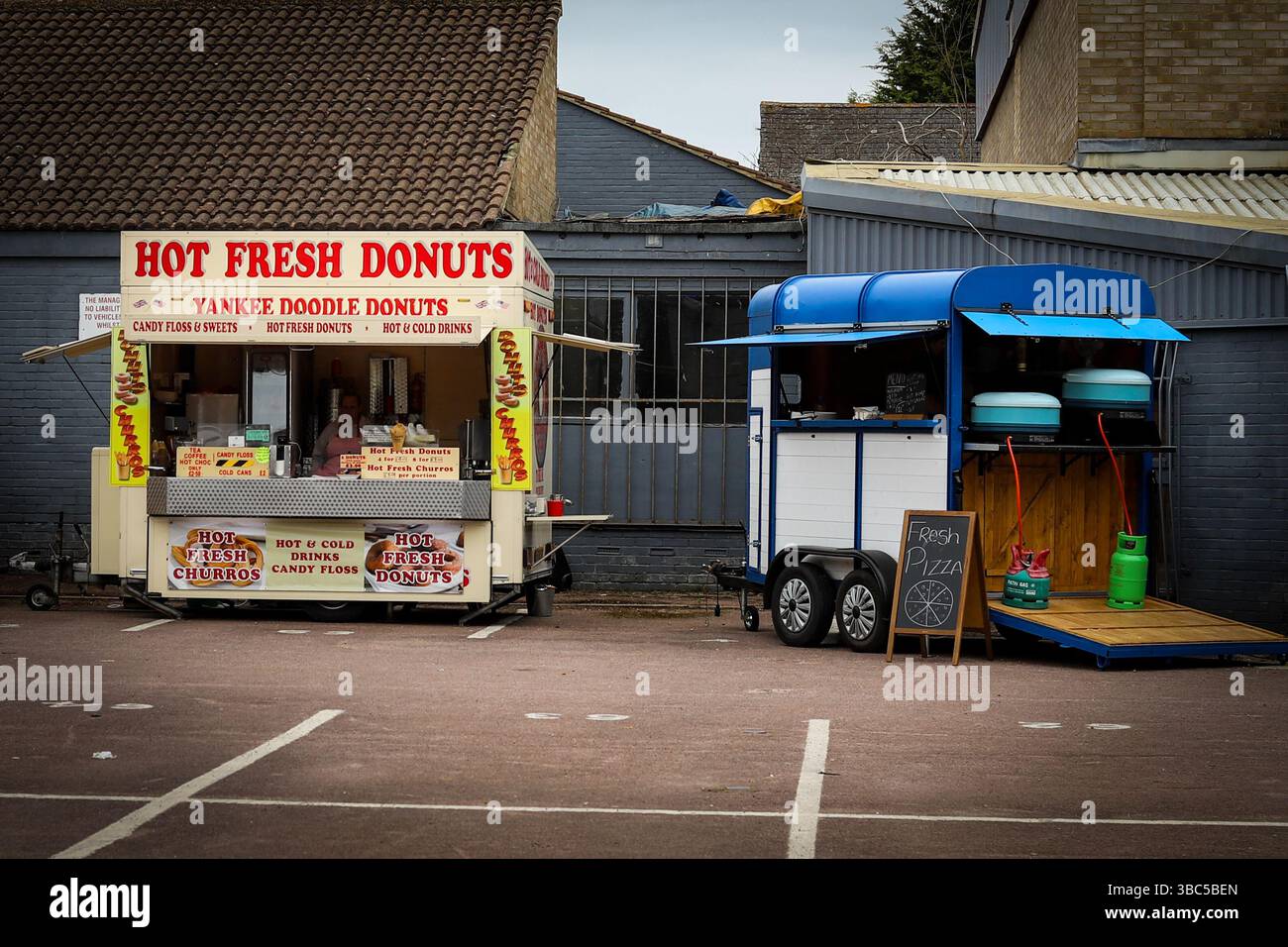 Fast Food street food vendors in a car park at an event in England, UK ...