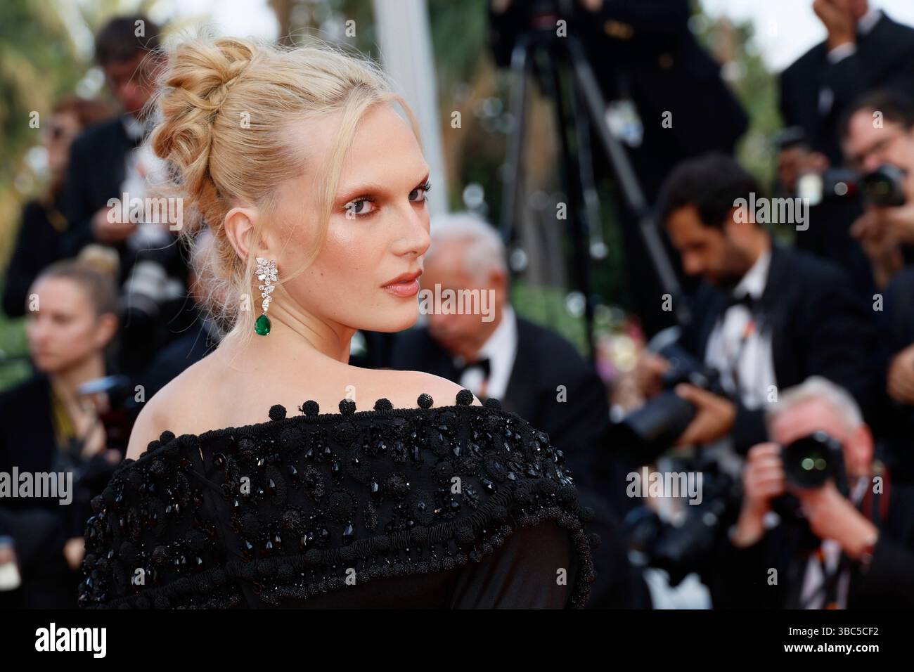 Alex Consani poses for photographers upon arrival at the premiere of ...