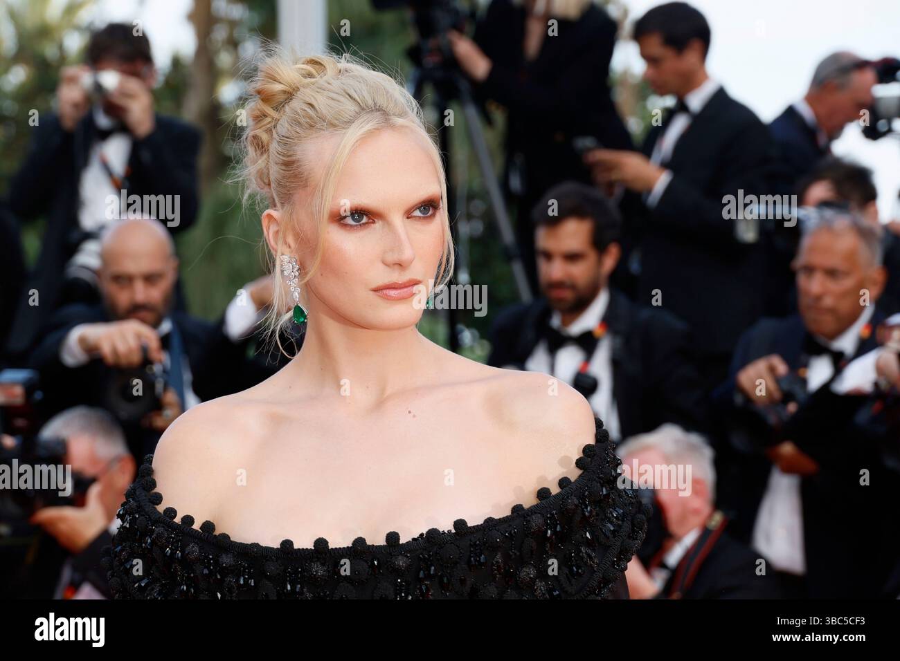 Alex Consani poses for photographers upon arrival at the premiere of ...