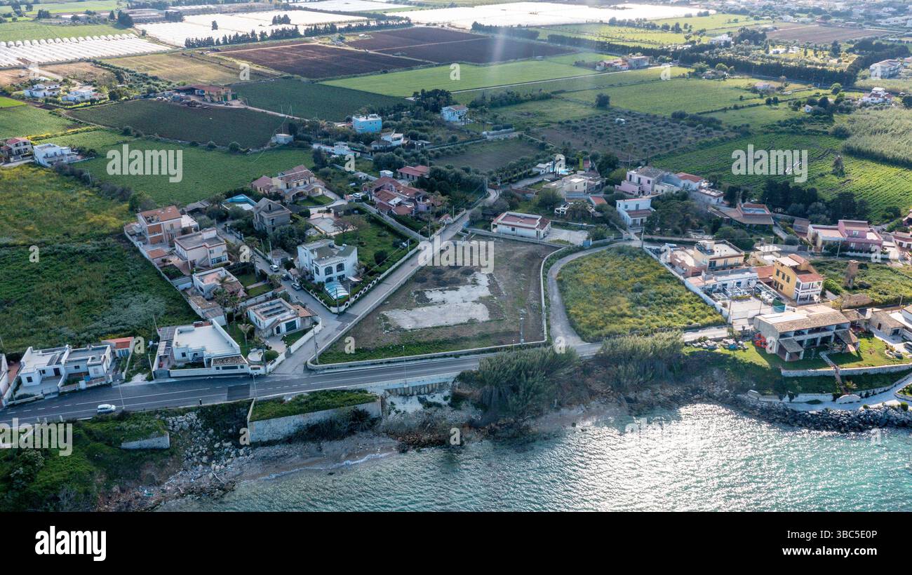 Coastal residential area with farmland and open fields Stock Photo - Alamy