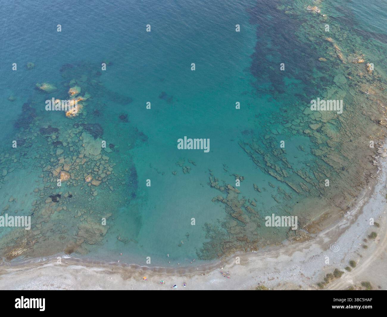Aerial View of Rocky Seabed and Small Beach on the South Coast of Crete ...
