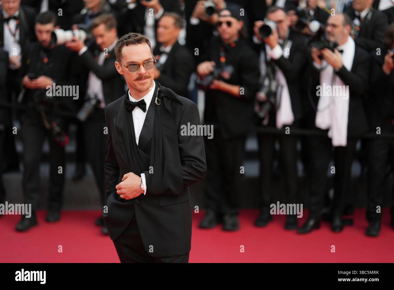 Benedict Cumberbatch poses for photographers upon arrival at the ...