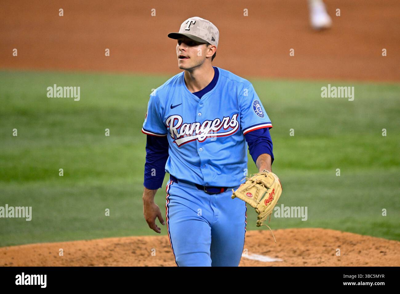 Texas Rangers starting pitcher Jack Leiter comes off the field after ...