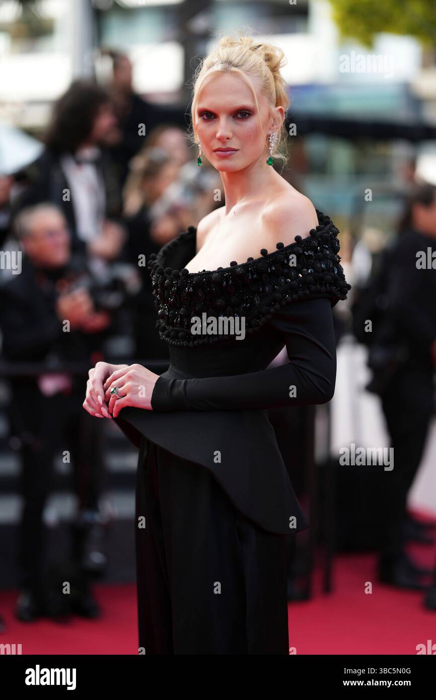 Alex Consani poses for photographers upon arrival at the premiere of ...