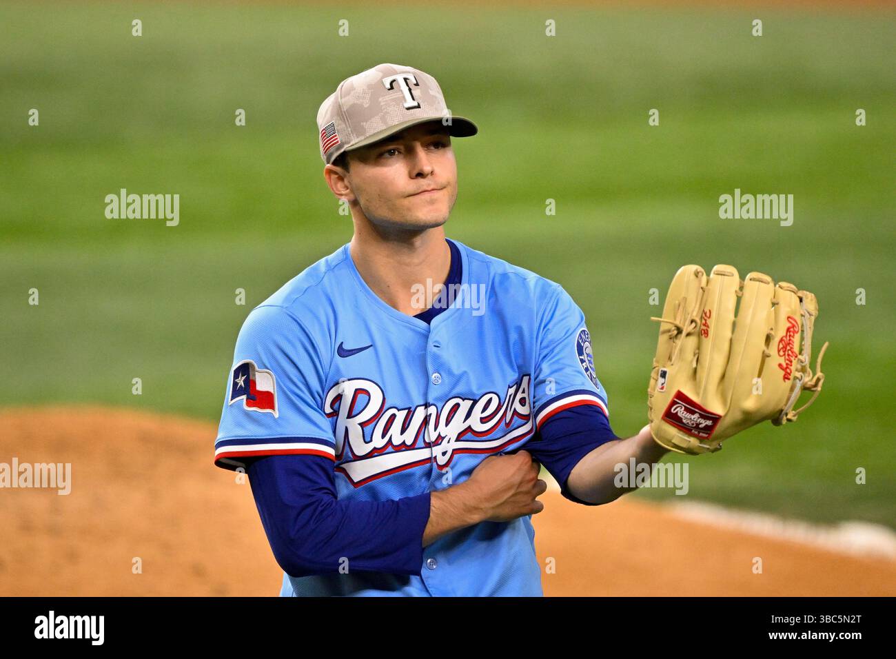 Texas Rangers starting pitcher Jack Leiter comes off the field after ...