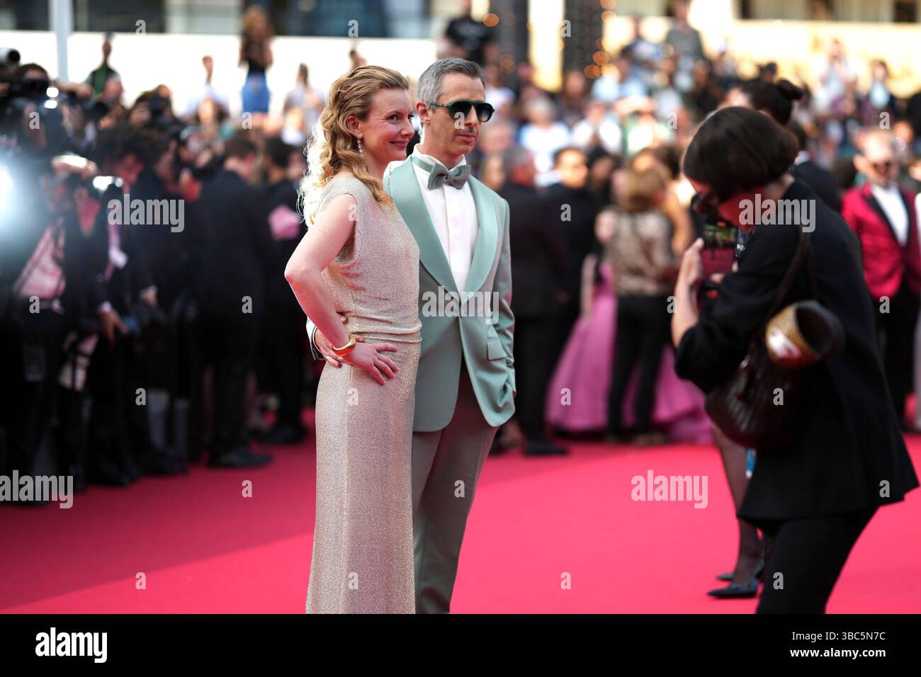 Emma Wall, left, and jury member Jeremy Strong pose for photographers ...