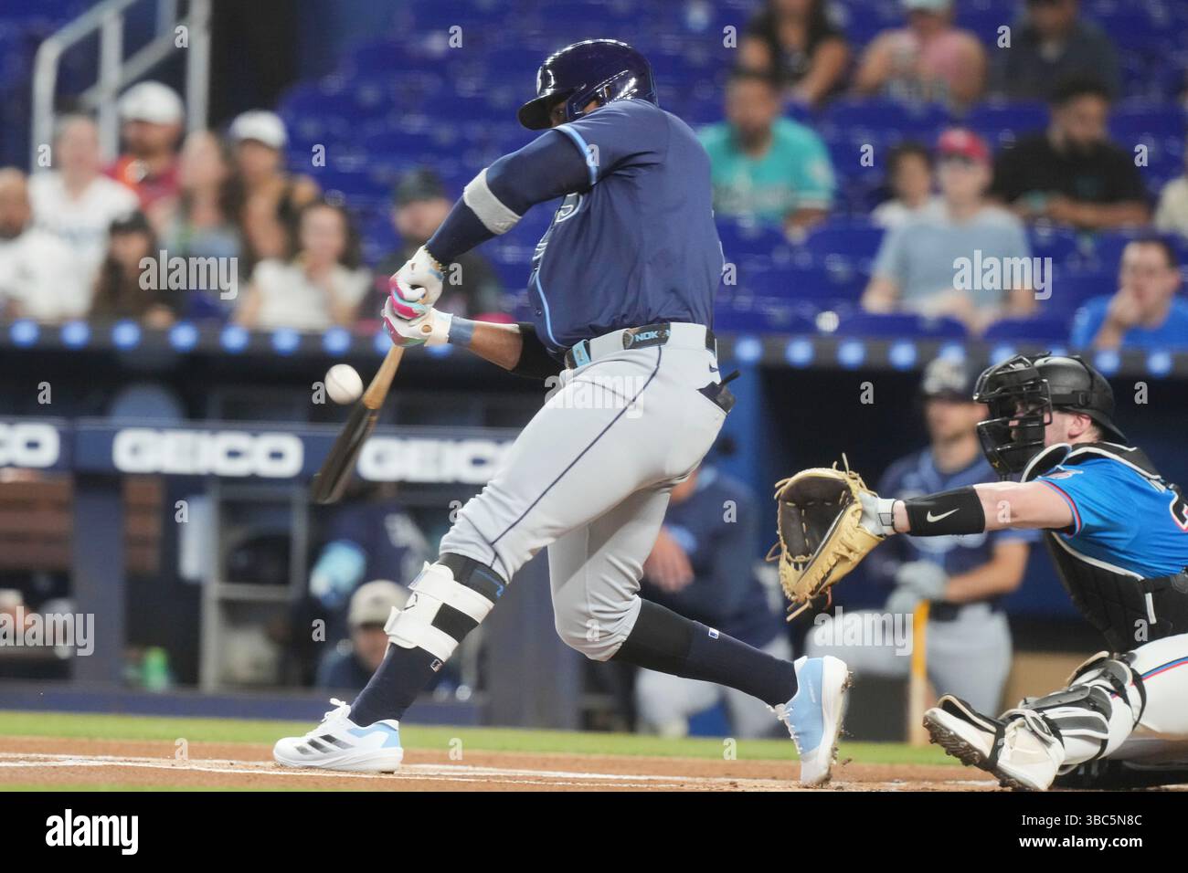 Tampa Bay Rays' Yandy Díaz hits a single to left field during the first ...