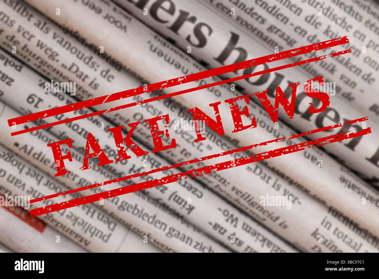 Red Fake News stamp and newspapers in different languages as background ...