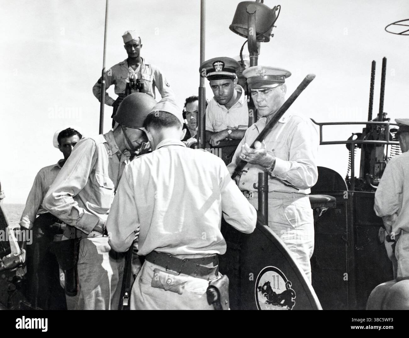 Major General Johnson inspecting a captured sword following the ...