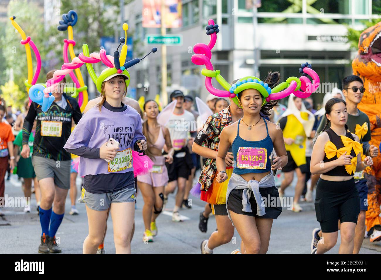 SAN FRANCISCO, CA - MAY 18: Costumed runners race during the 112th ...