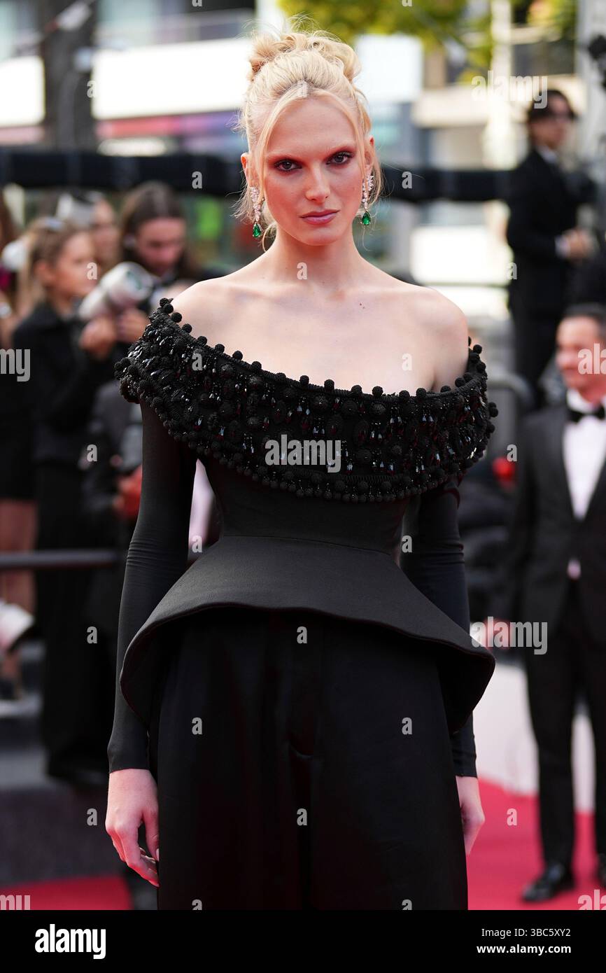 Alex Consani poses for photographers upon arrival at the premiere of ...