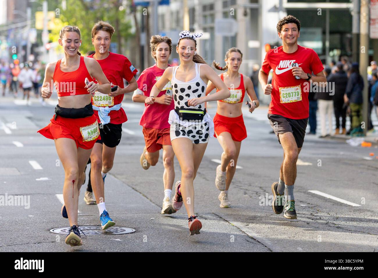 SAN FRANCISCO, CA - MAY 18: Costumed runners race during the 112th ...