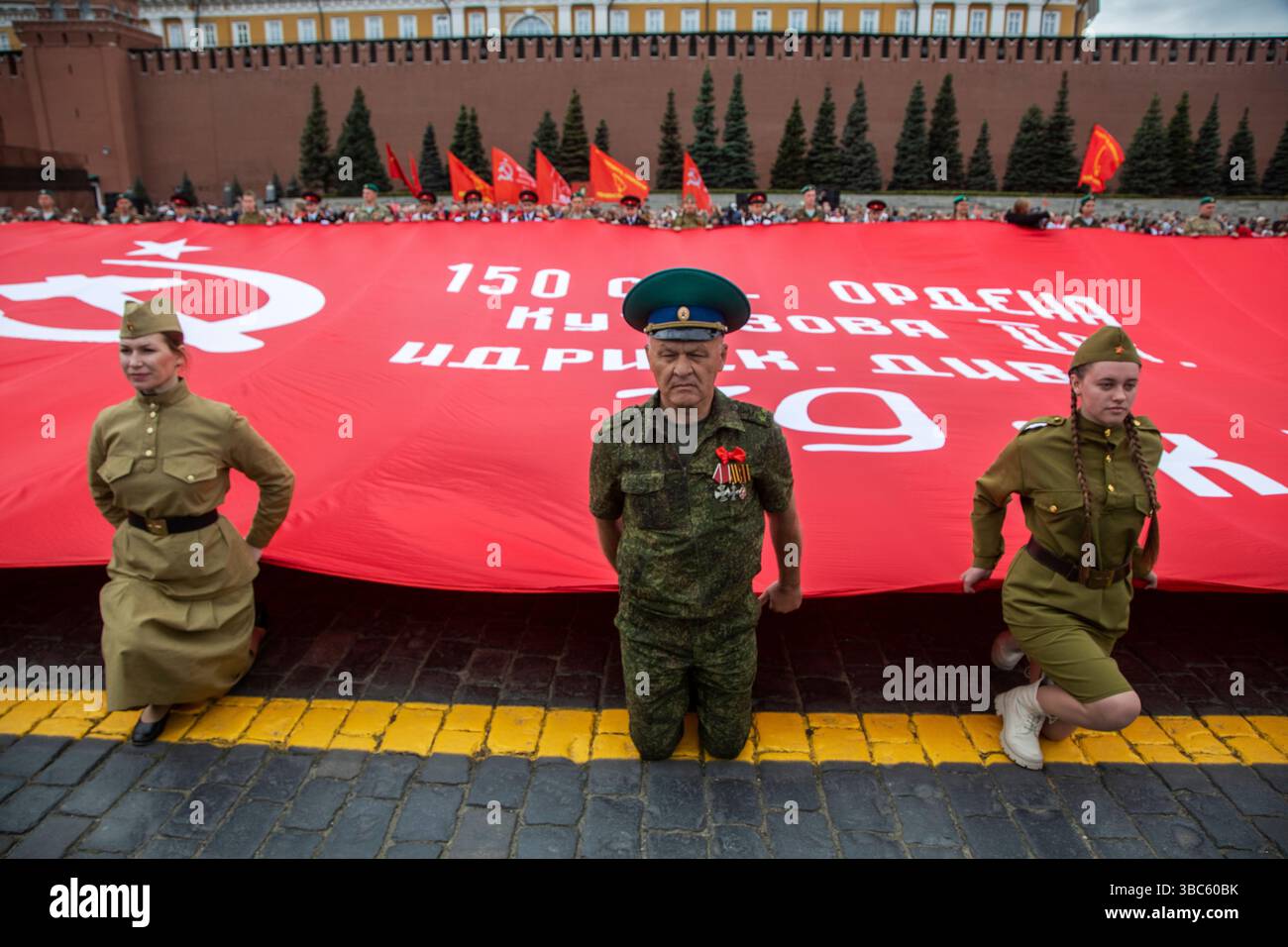Moscow, Russia. 18th of May, 2025. Russians hold a giant replica of the ...