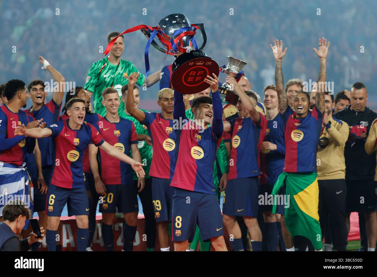 Barcelona's Pedri lifts the trophy during celebration of winning the La ...