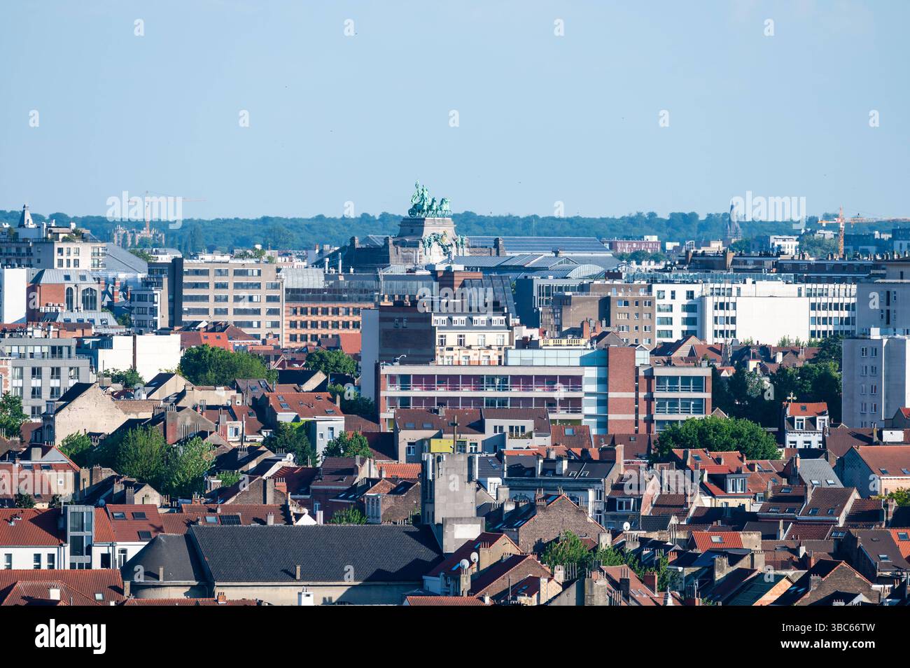 Cityscape over houses, apartment blocks and historical monuments in ...