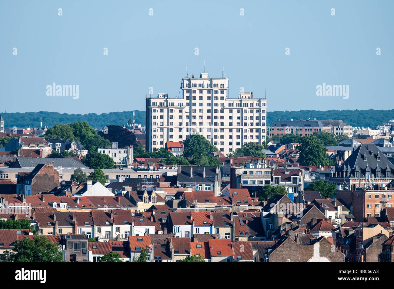 Cityscape over houses, apartment blocks and historical monuments in ...