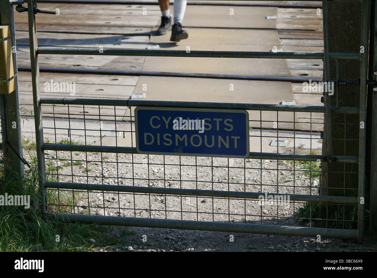Signs at railroad crossings warning of an approaching train. Dorking ...
