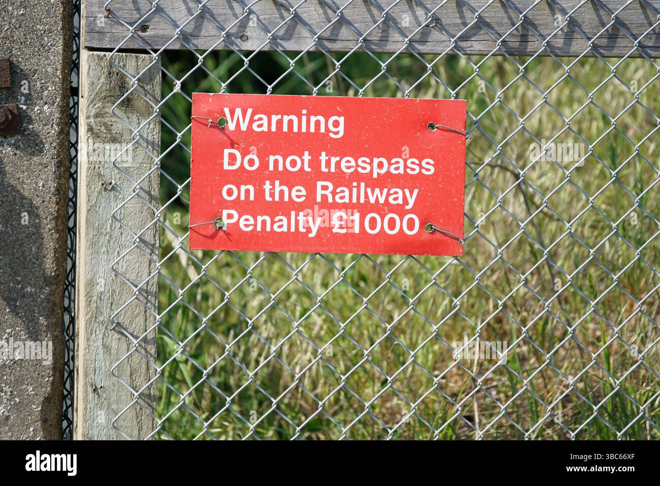 Signs at railroad crossings warning of an approaching train. Dorking ...