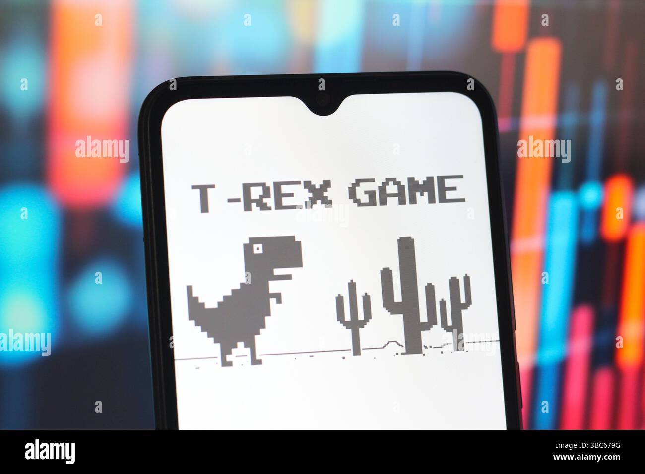 In this photo illustration, the T-Rex Game (Chrome Dino) logo is seen displayed on a smartphone ...