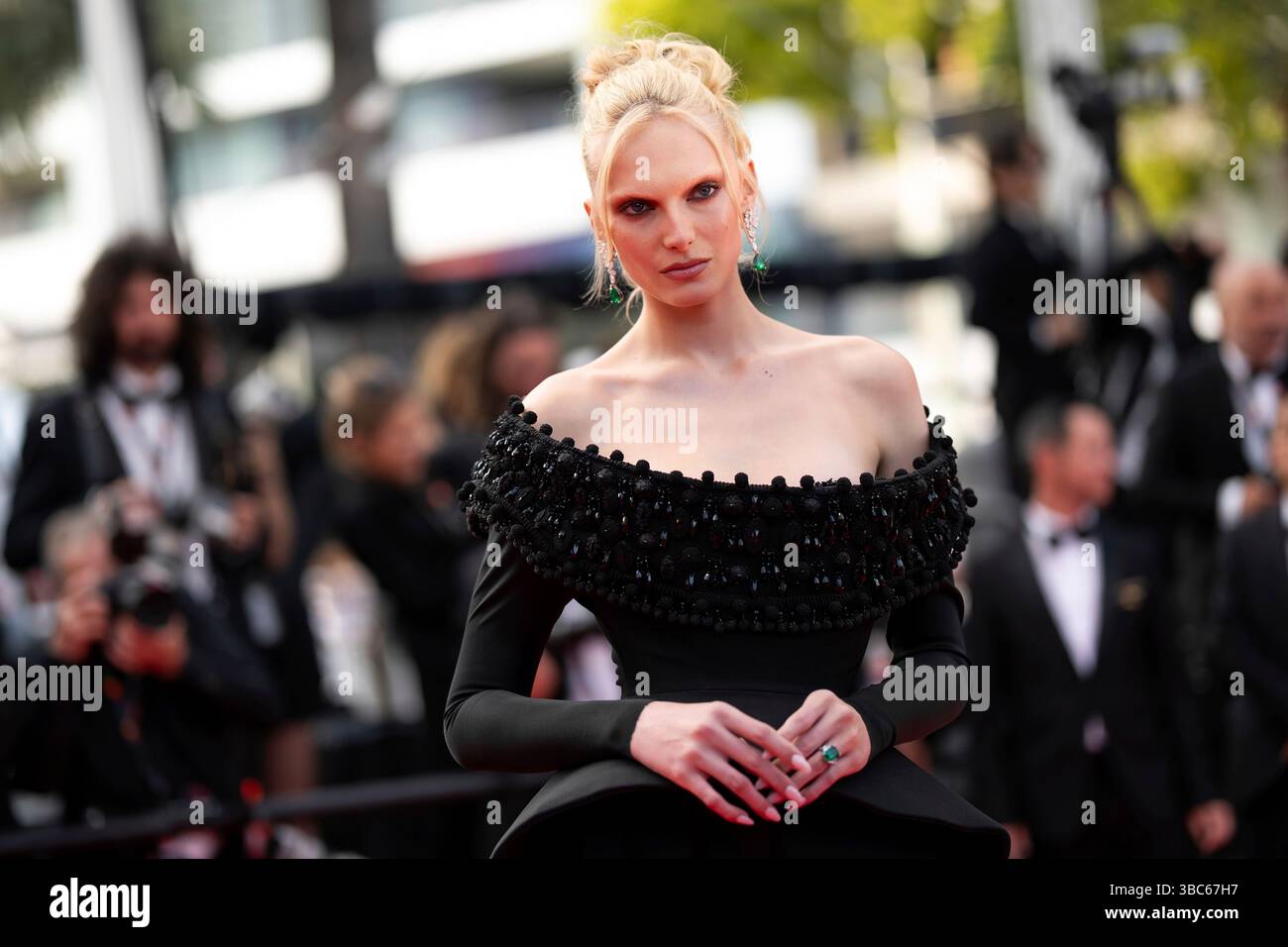 Alex Consani poses for photographers upon arrival at the premiere of ...