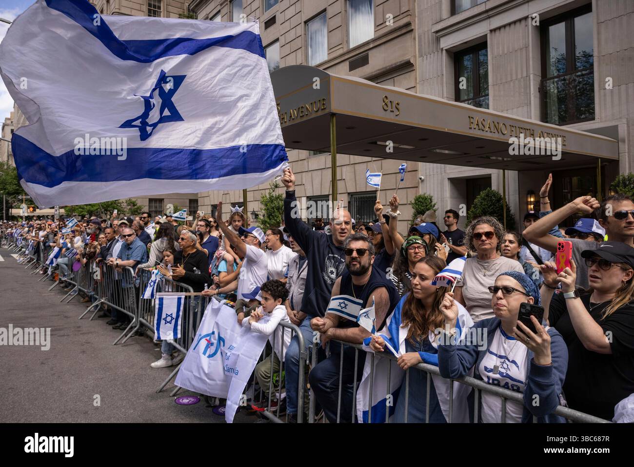 People raise Israeli flag as former hostage families and supporters ...