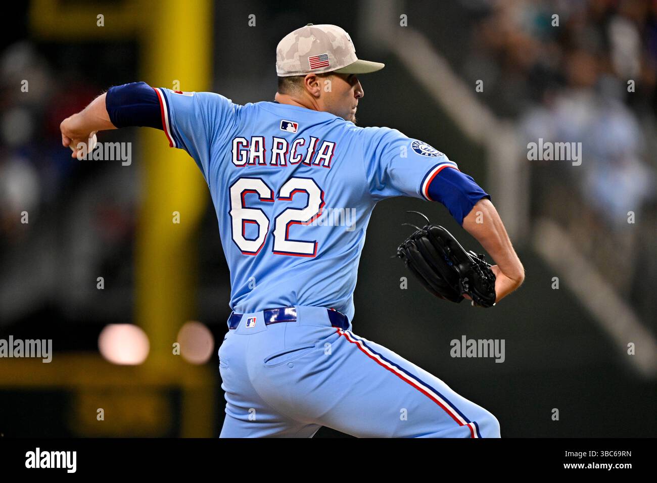 Texas Rangers relief pitcher Robert Garcia throws during the eighth ...